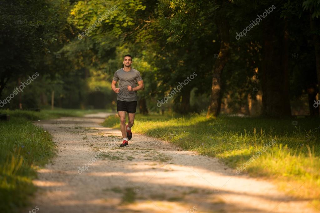 Man Fitness Jogging Workout Wellness Concept Stock Photo by ©ibrak 81950814