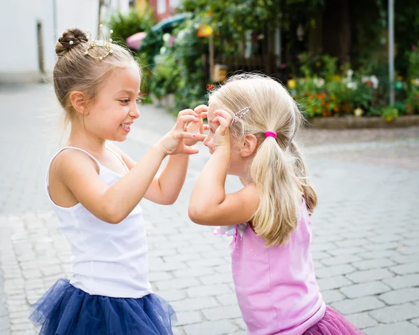 Cheeky little sisters — Stock Photo © locrifa #87785320