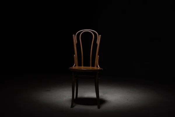 Chair in a dark scary prison — Stock Photo © innovatedcaptures #107131924