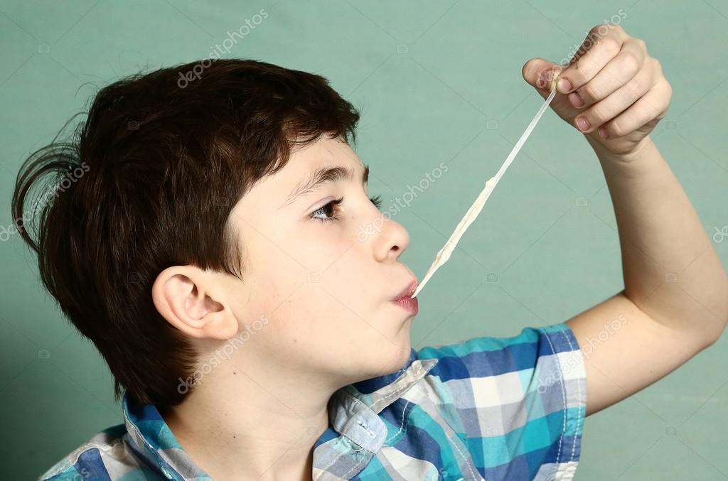 Boy pull chewing gum with his hand from moth Stock Photo by ©Ulianna ...