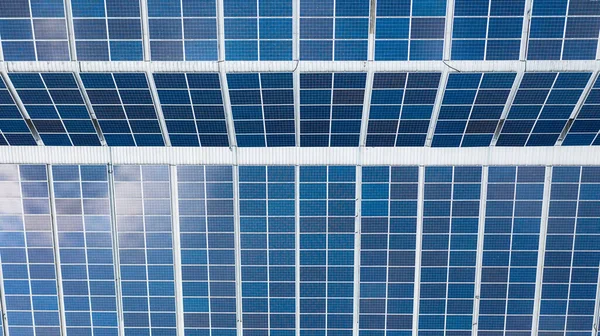 Aerial top view of the solar cells on the roof, Solar panels installed ...
