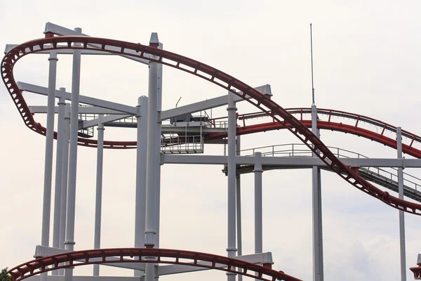 Amusement Park and Roller Coasters loops — Stock Photo © Naypong #85990054