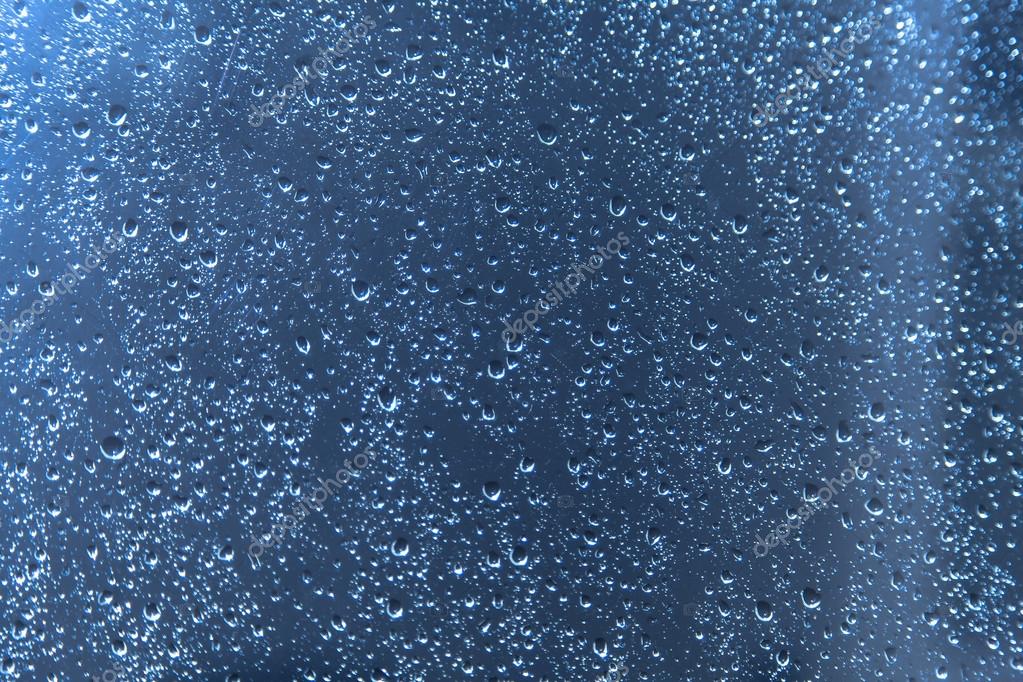 Raindrops on glass Background texture — Stock Photo © Naypong #86088056