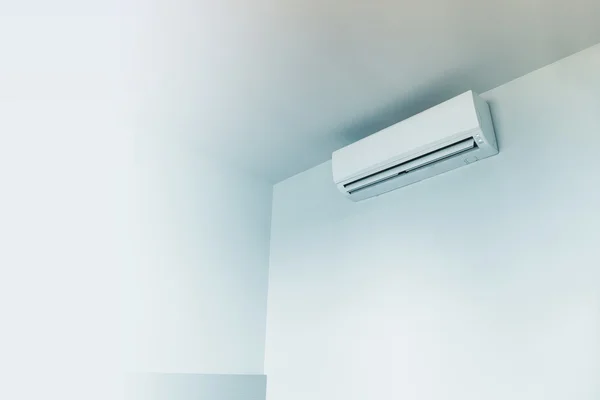 Air conditioner on wall background Stock Photo by ©Naypong 86092258