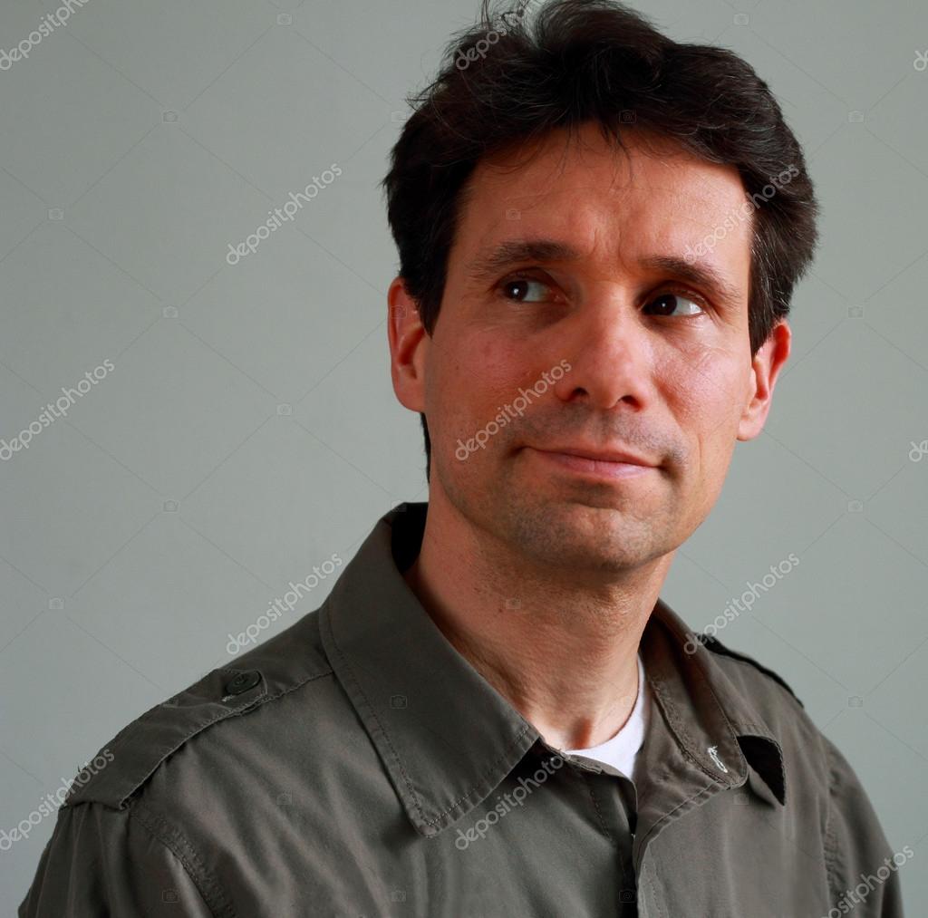 White Man Looking Sideways up — Stock Photo © j-foto #67934161 White Man Looking Sideways up — Stock Photo © j-foto #67934161