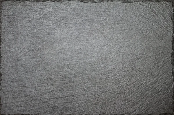 Plain black stone slate board in full frame. - Stock Image - Everypixel