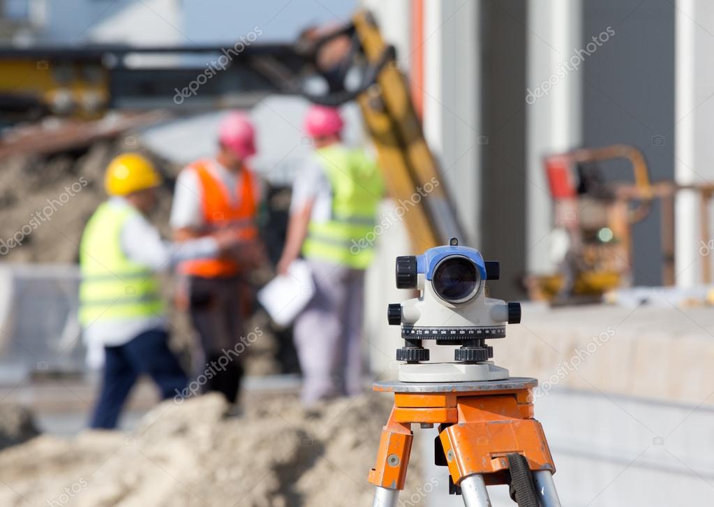 Theodolite at construction site Stock Photo by ©budabar 112560040