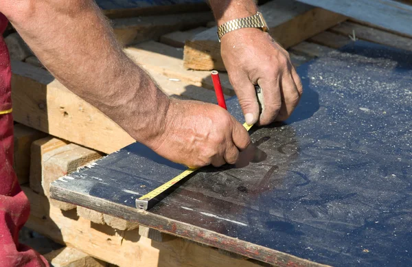 Close-up process of measuring panel with level — Stock Photo © love1990 ...