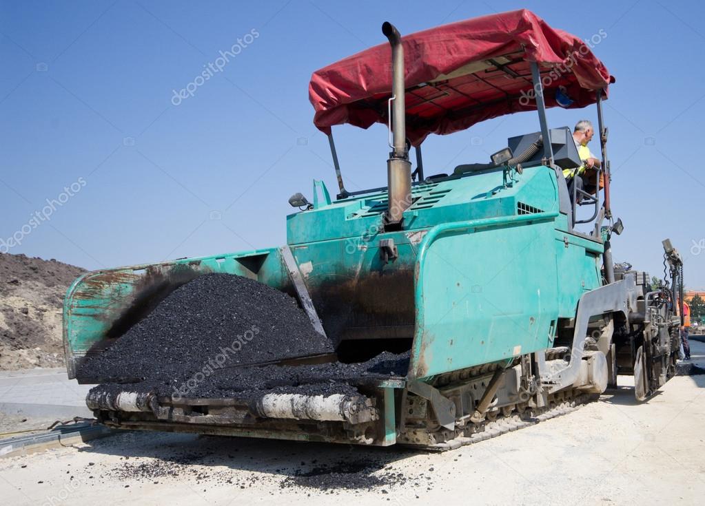 Asphalt finisher machine Stock Photo by ©budabar 82464274