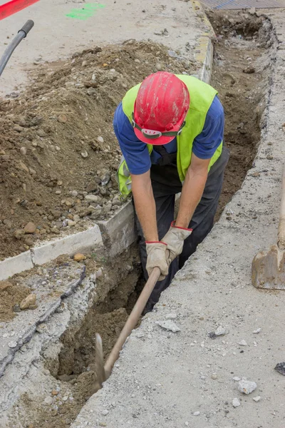 Dig with a pickaxe Stock Photo by ©kataklinger 57513685