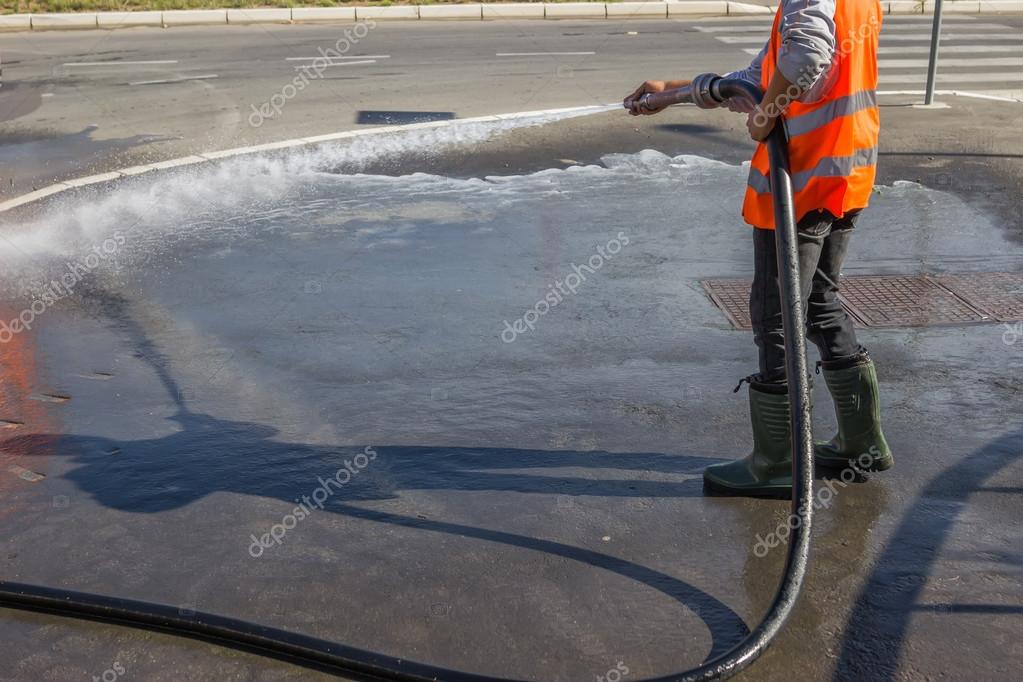 Street sprayed clean with pressurized water 2 — Stock Photo ...