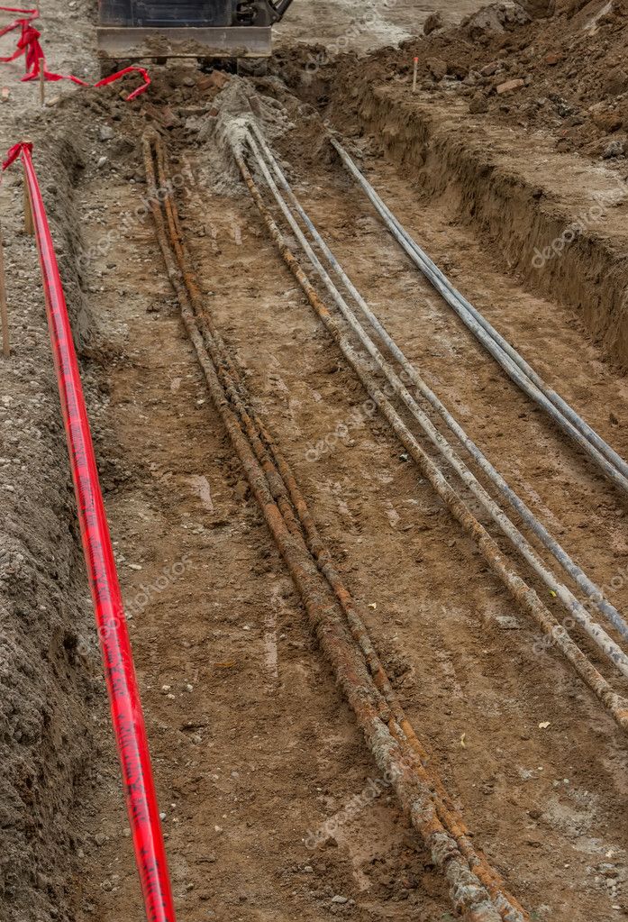 Underground cable installation Stock Photo by ©kataklinger 54111759