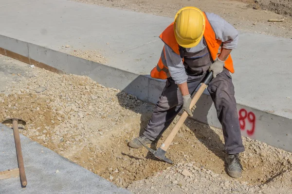 Dig with a pickaxe Stock Photo by ©kataklinger 57513685