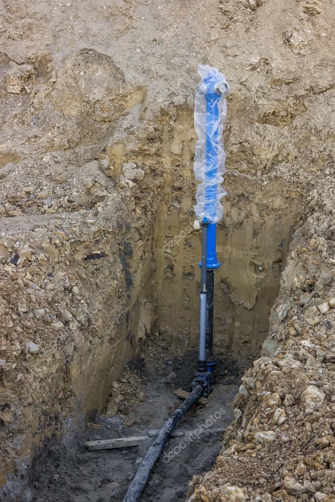 Fire hydrant installation — Stock Photo © kataklinger #61612791