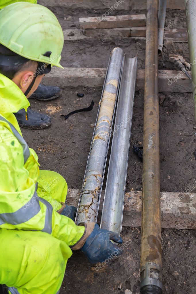 Technician holds a core sample Stock Photo by ©kataklinger 89294194