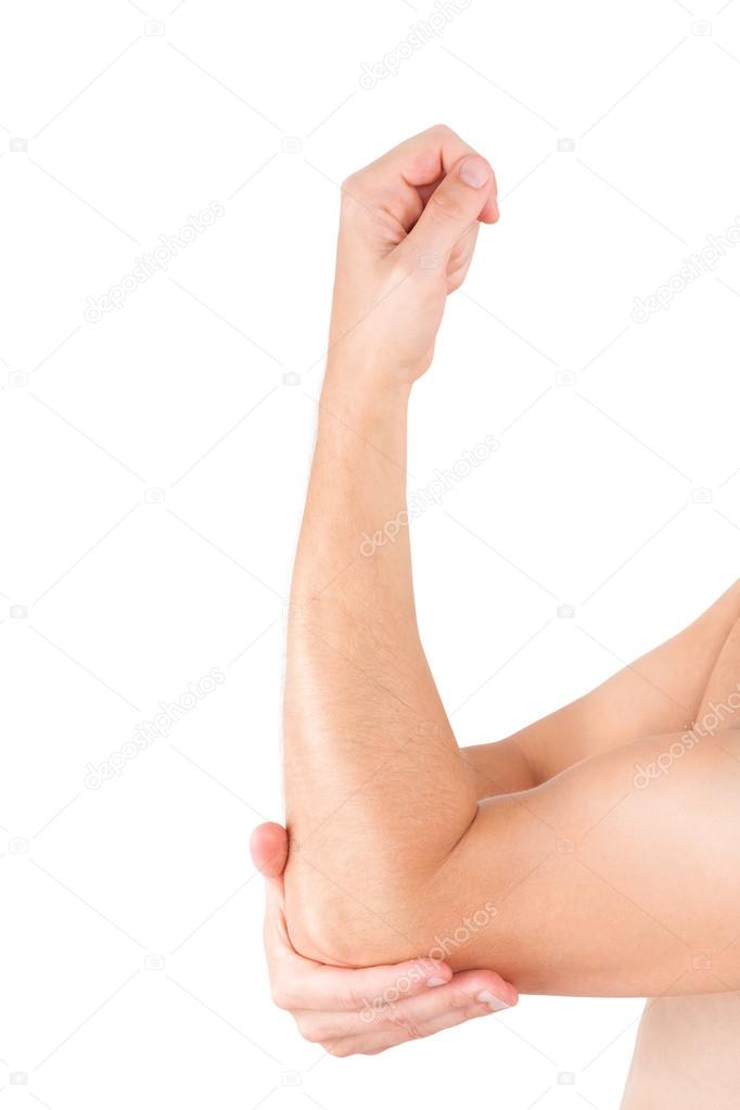Hombre sosteniendo su codo, dolor de codo. 2024