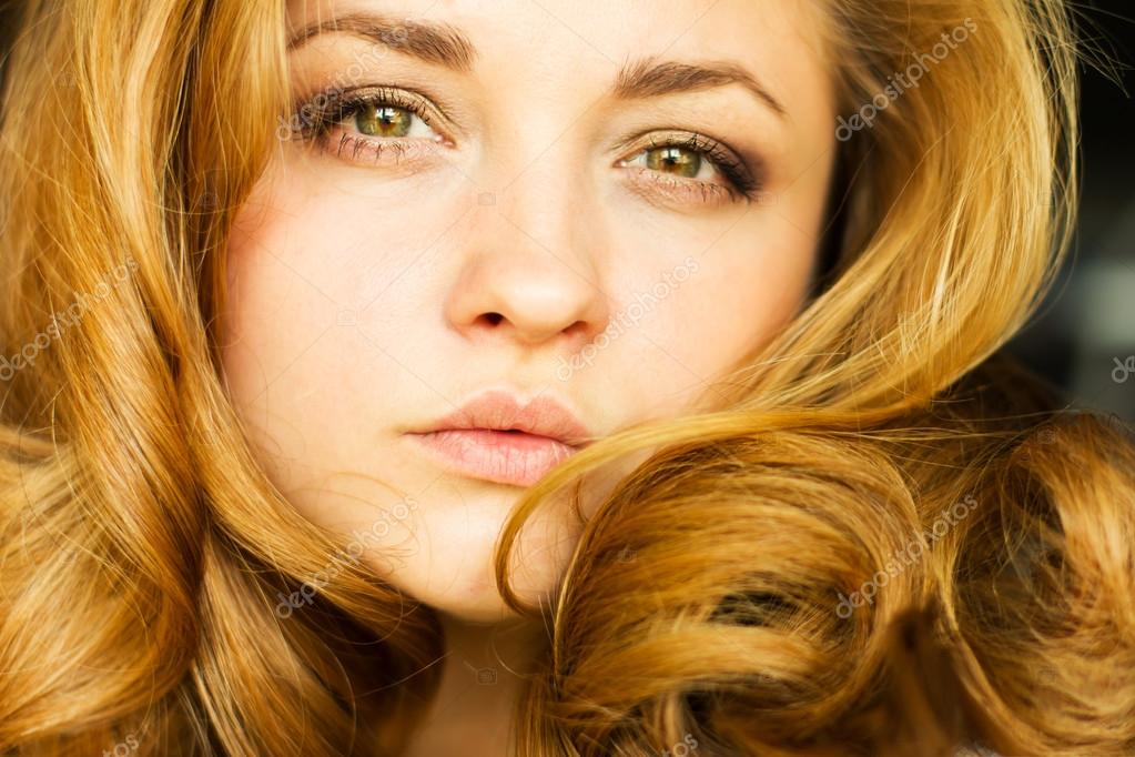 Beautiful woman with luxurious light hair. Portrait of a young woman ...