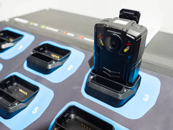 Chest video recorder. Body-worn video recorder at charging station ...