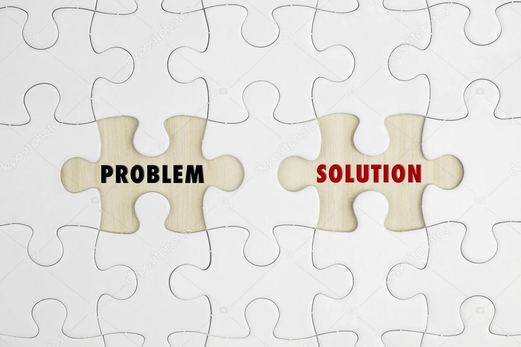 Jigsaw puzzle on wood background with a word PROBLEM and SOLUTION ...