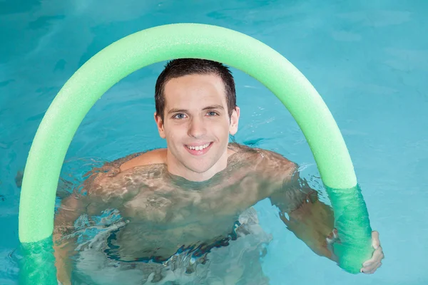 Man floating in the pool Stock Photo by ©Implementar 65177799