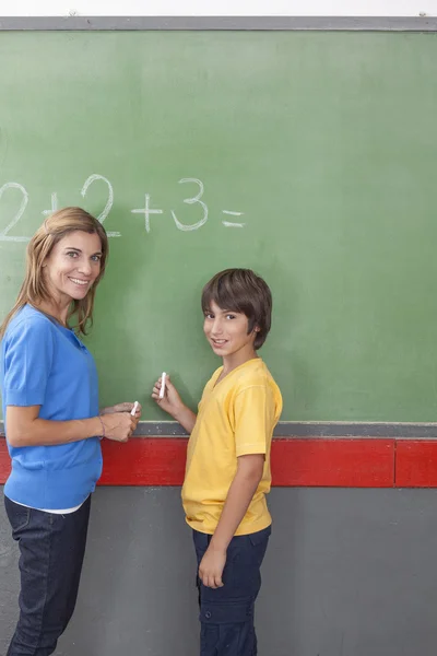 The teacher teaching math - Stock Image - Everypixel