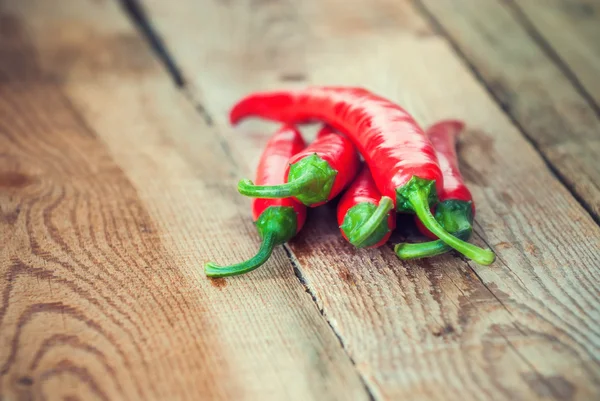 Very spicy peppers, chili, cayenne, jalapeno, peperoncino on woo ...