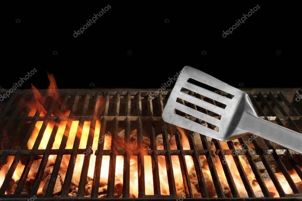 Spatula on the Flaming BBQ Grill — Stock Photo © aruba2000 #63024587