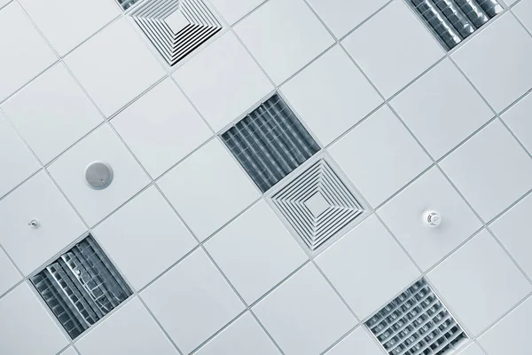 White office ceiling with lighting and ventilation equipment. - Stock ...