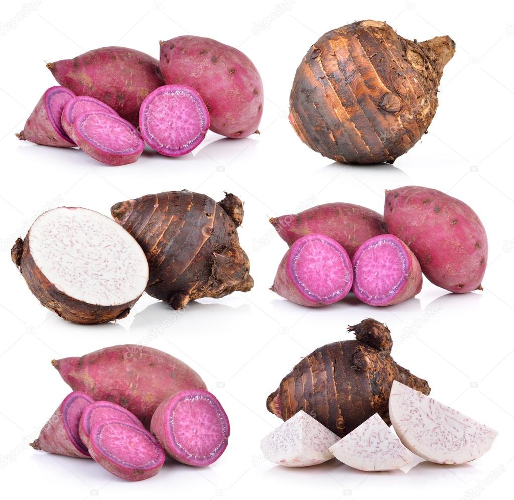Taro roots and sweet potato on the white background Stock Photo by ...