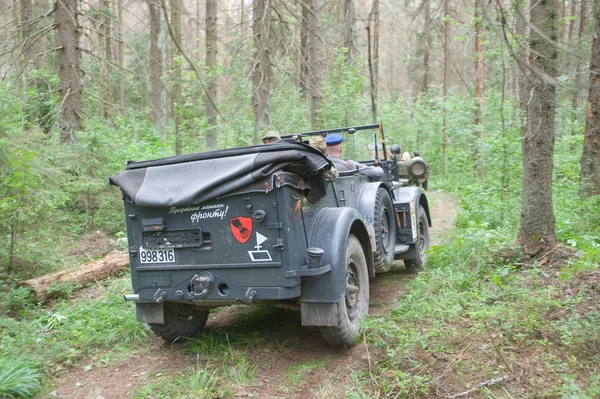 German car Horch-901 on retro rally in the woods, 3rd international ...