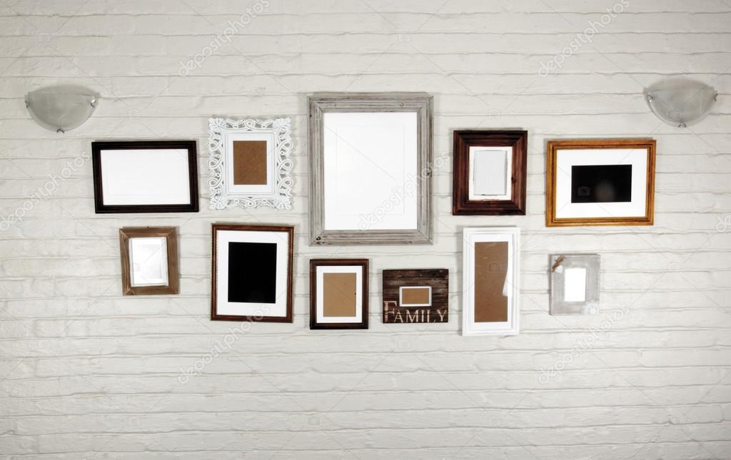 Empty Frames and Lamps on White Bagged Wall — Stock Photo © lcswart ...