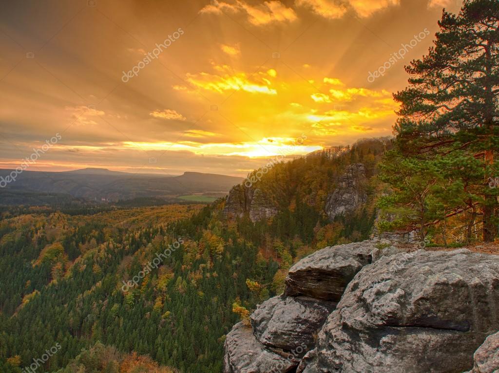 Autumn sunset view over sandstone rocks to fall colorful valley of ...