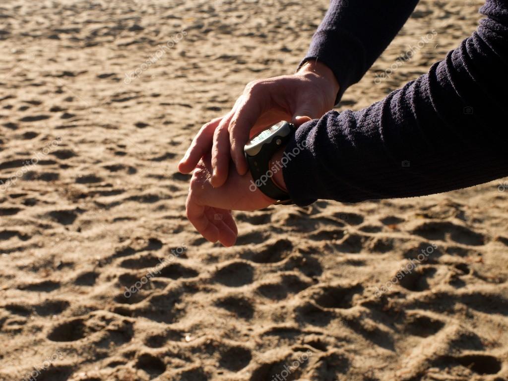 Tall man in running cloths at sandy beach in sport and healthy ...