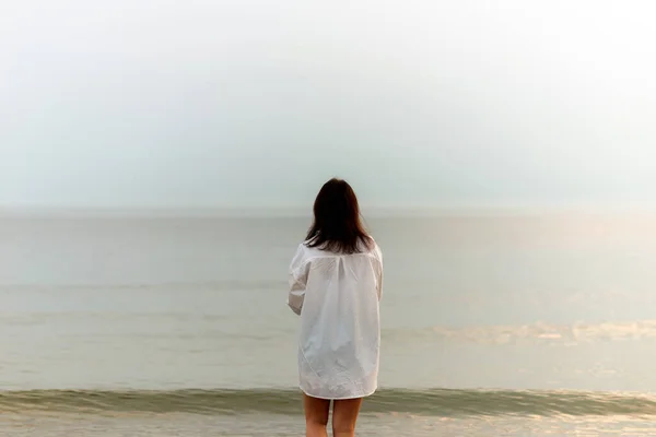 Woman standing alone Stock Photos, Royalty Free Woman standing alone ...