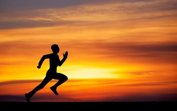 Silhouette of running man against the colorful sky. Silhouette o ...