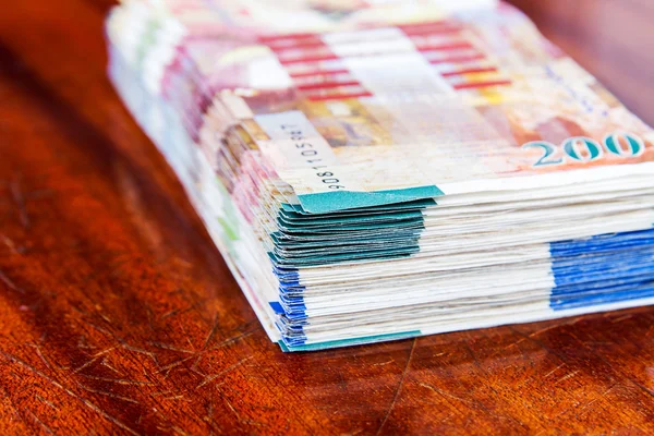 Two hundred shekel bank notes . — Stock Photo © suprunvit #82199738