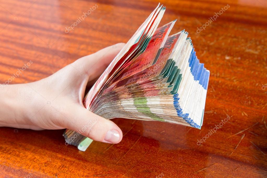 Two hundred shekel bank notes . — Stock Photo © suprunvit #82199744