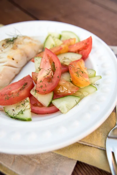 Cod Fish with Cucumbers and Tomatoes - Stock Image - Everypixel