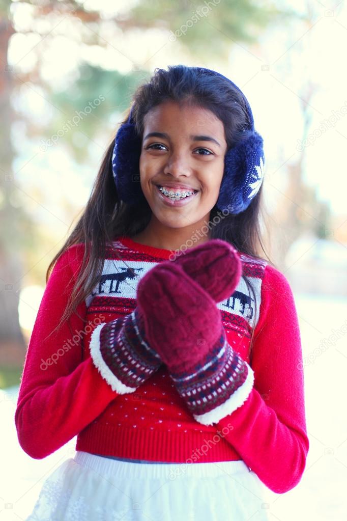 Beautiful tween girl in a winter park — Stock Photo © lilyaespinosa ...