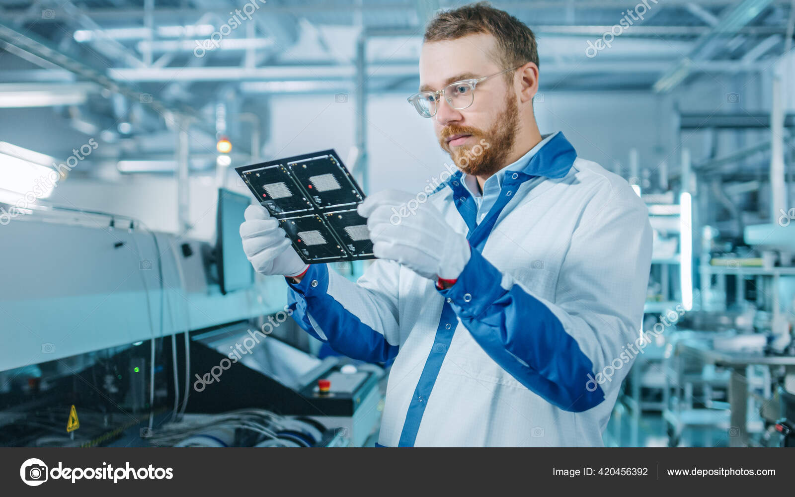 High-Tech Factory: Quality Control Inspector Checks Electronic Printed ...
