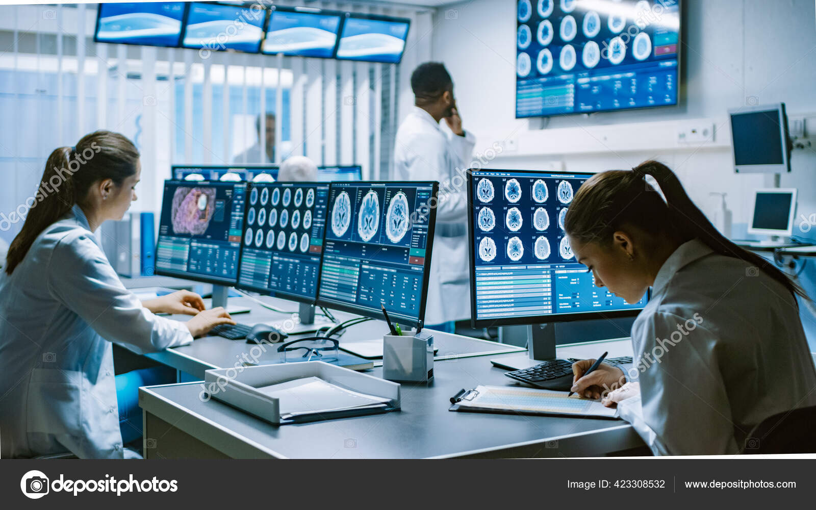 Team of Professional Scientists Work in the Brain Research Laboratory ...