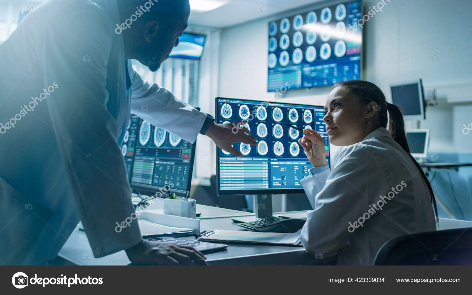 Two Scientists in the Brain Research Laboratory work on a Project ...