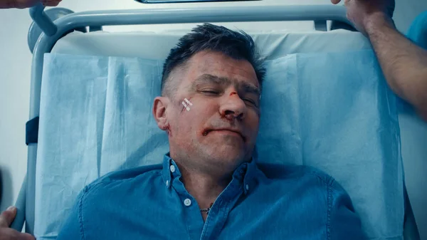 Top Down Shot, Paramedics,Doctors and Nurses Moving Seriously Injured ...