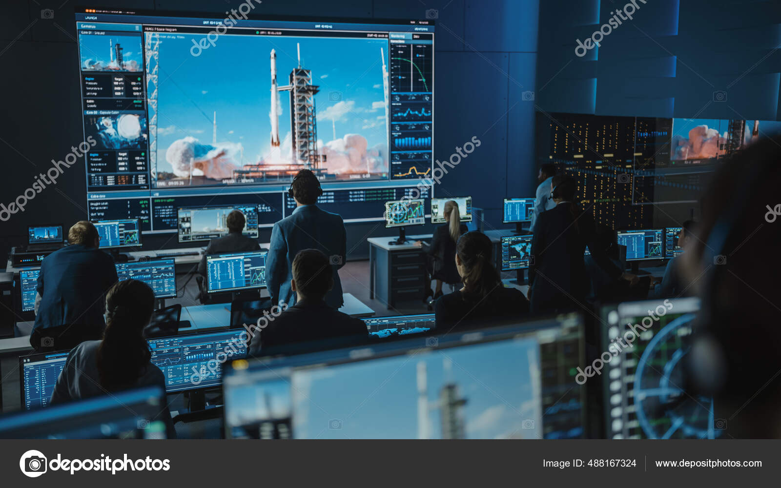 Group of People in Mission Control Center Witness Successful Space ...