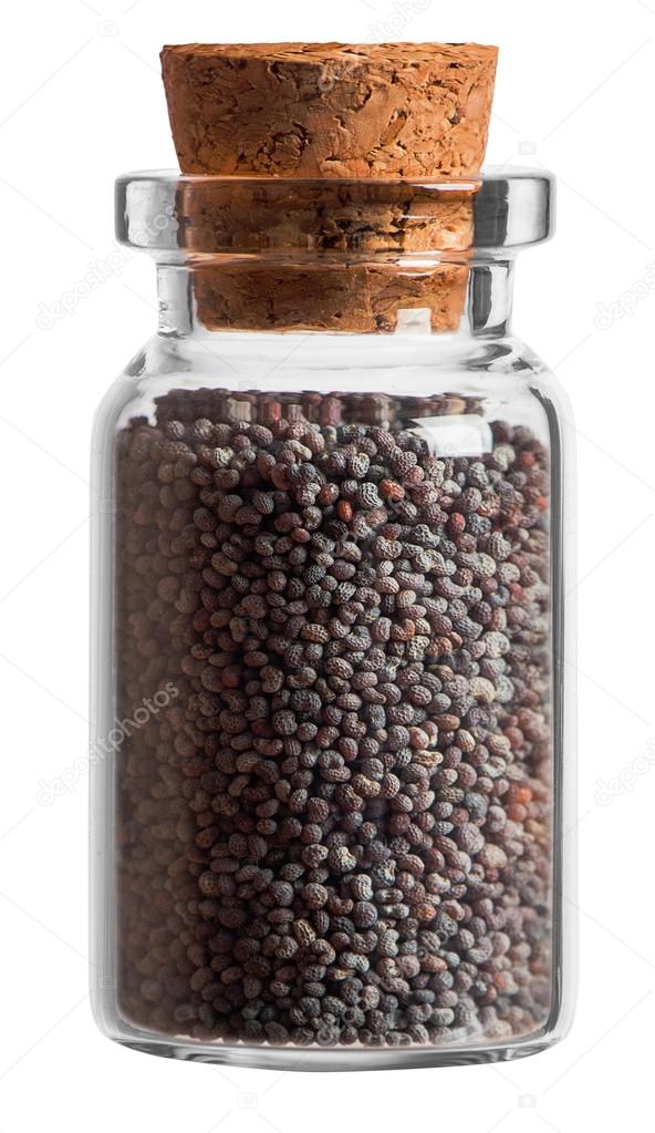 Poppy spice in a little bottle isolated on white background Stock Photo ...