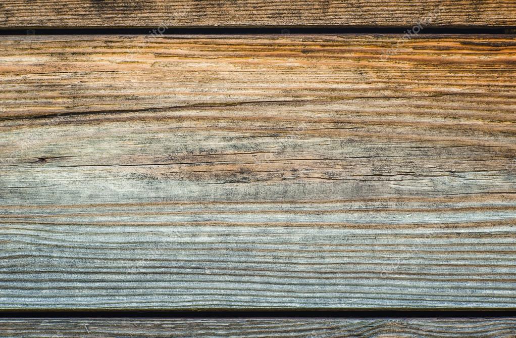 Weathered wood panel background — Stock Photo © Drummatra #64622881