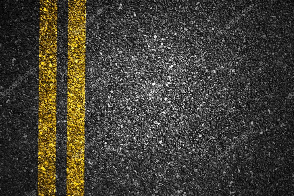 Asphalt road with yellow stripes — Stock Photo © somchaij #61746841