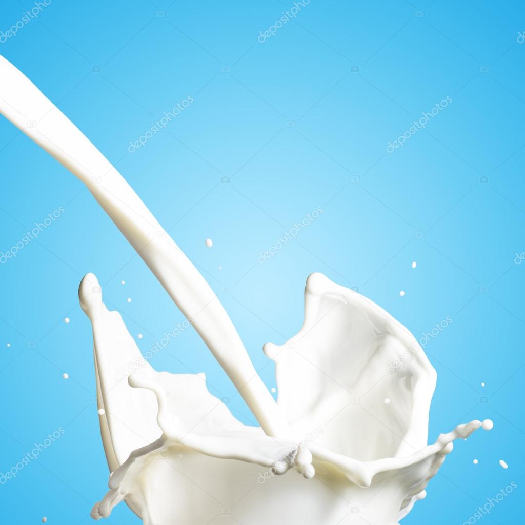 Milk Splash from bottle — Stock Photo © somchaij #64741233