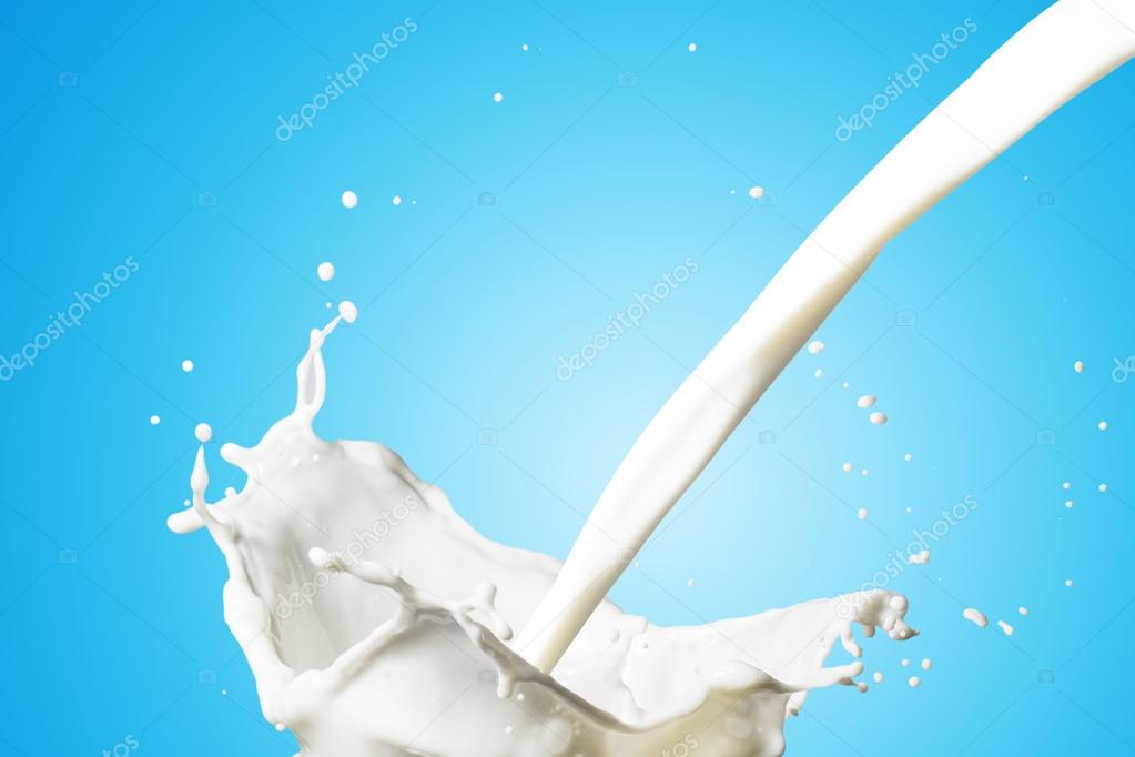 Milk Splash from bottle Stock Photo by ©somchaij 64741303
