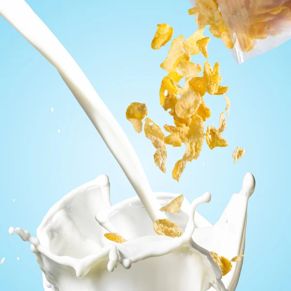 Corn Flakes With Milk Splash — Stock Photo © somchaij #77232940